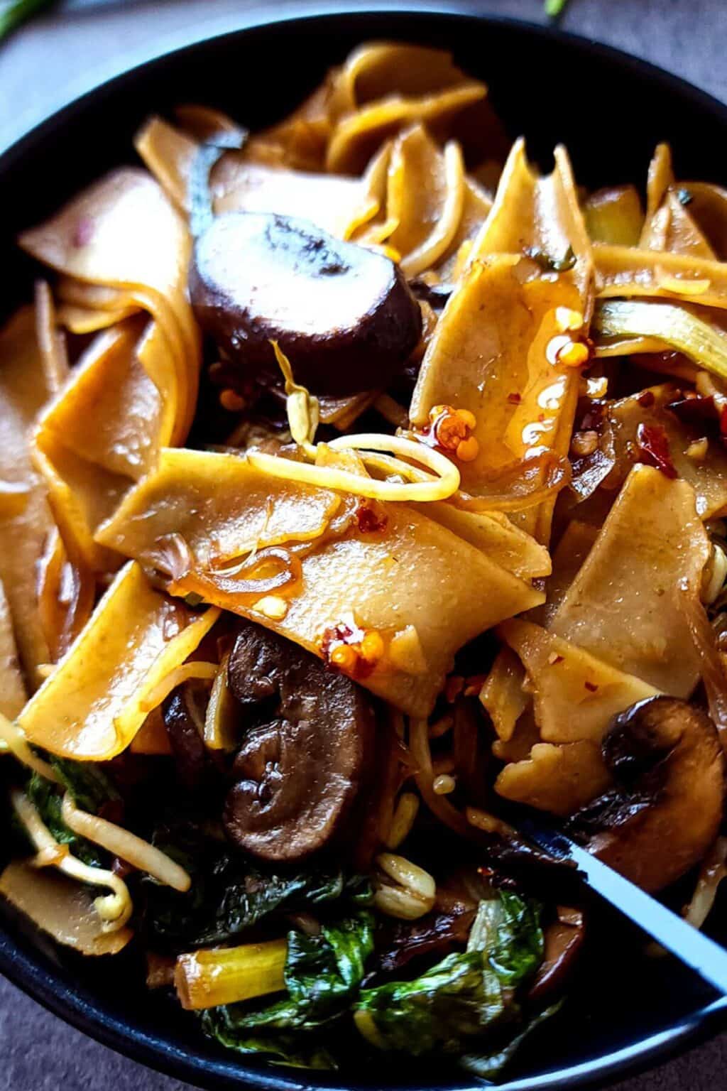 Ho fun noodles with mushrooms